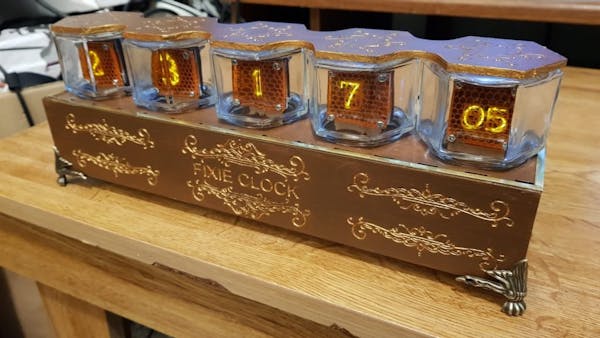 This Fixie Clock Is Made Using OLED-Based “Fake Nixie” Tubes - Hackster.io