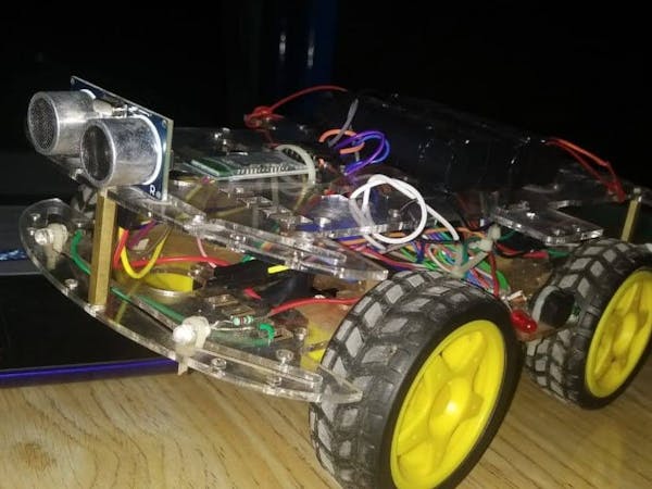 Bluetooth Controlled Obstacle Avoiding Arduino Robotic Car Arduino