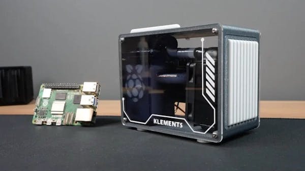 This 3D-Printed Case Keeps a Raspberry Pi 5 as Cool as Can Be — with a Custom Watercooling Loop ...